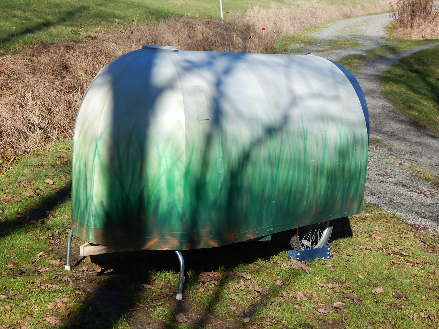 Man Builds $150 Mobile Tiny Home He Can Tow With His Bike
